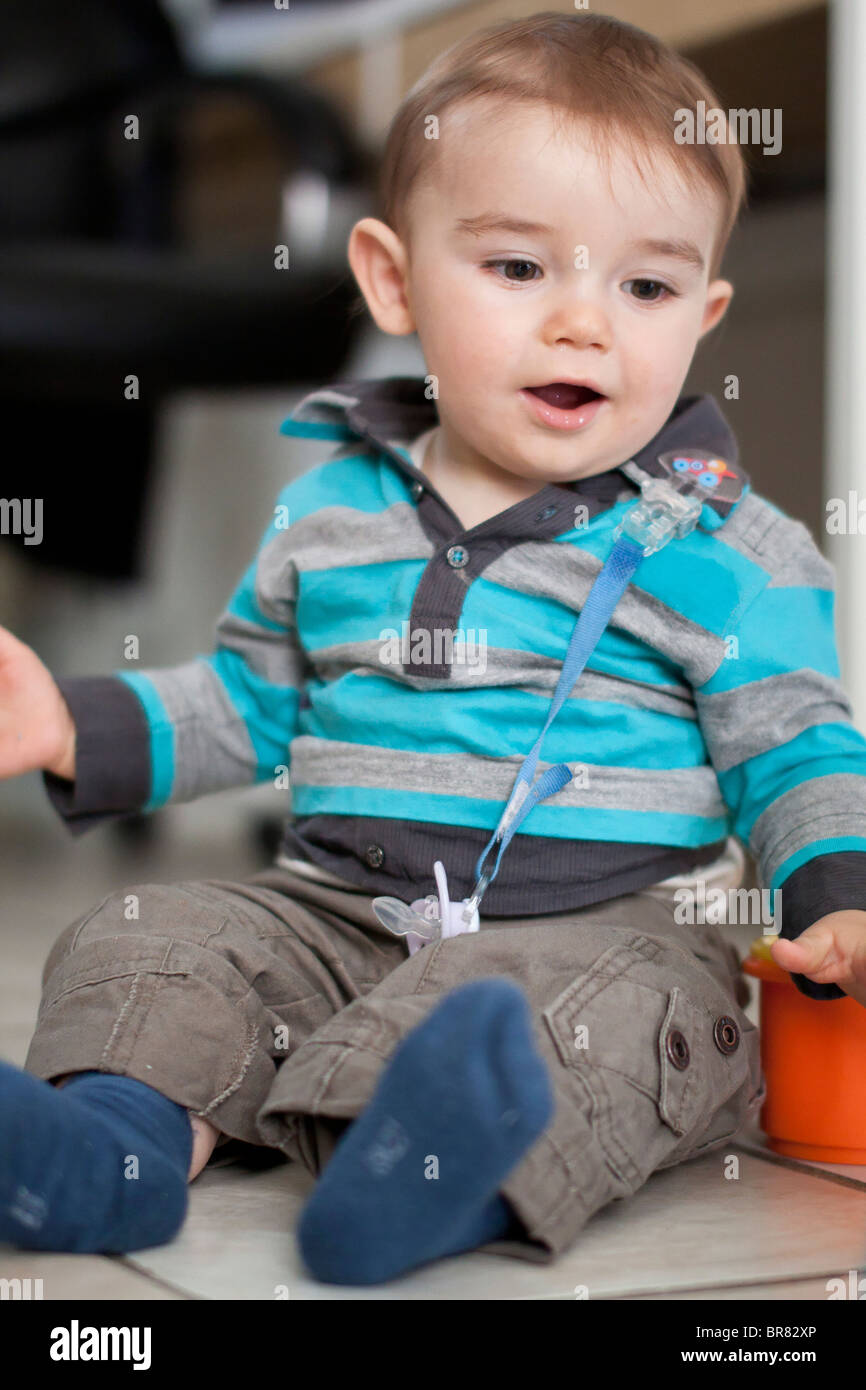 A toddler playing Stock Photo - Alamy
