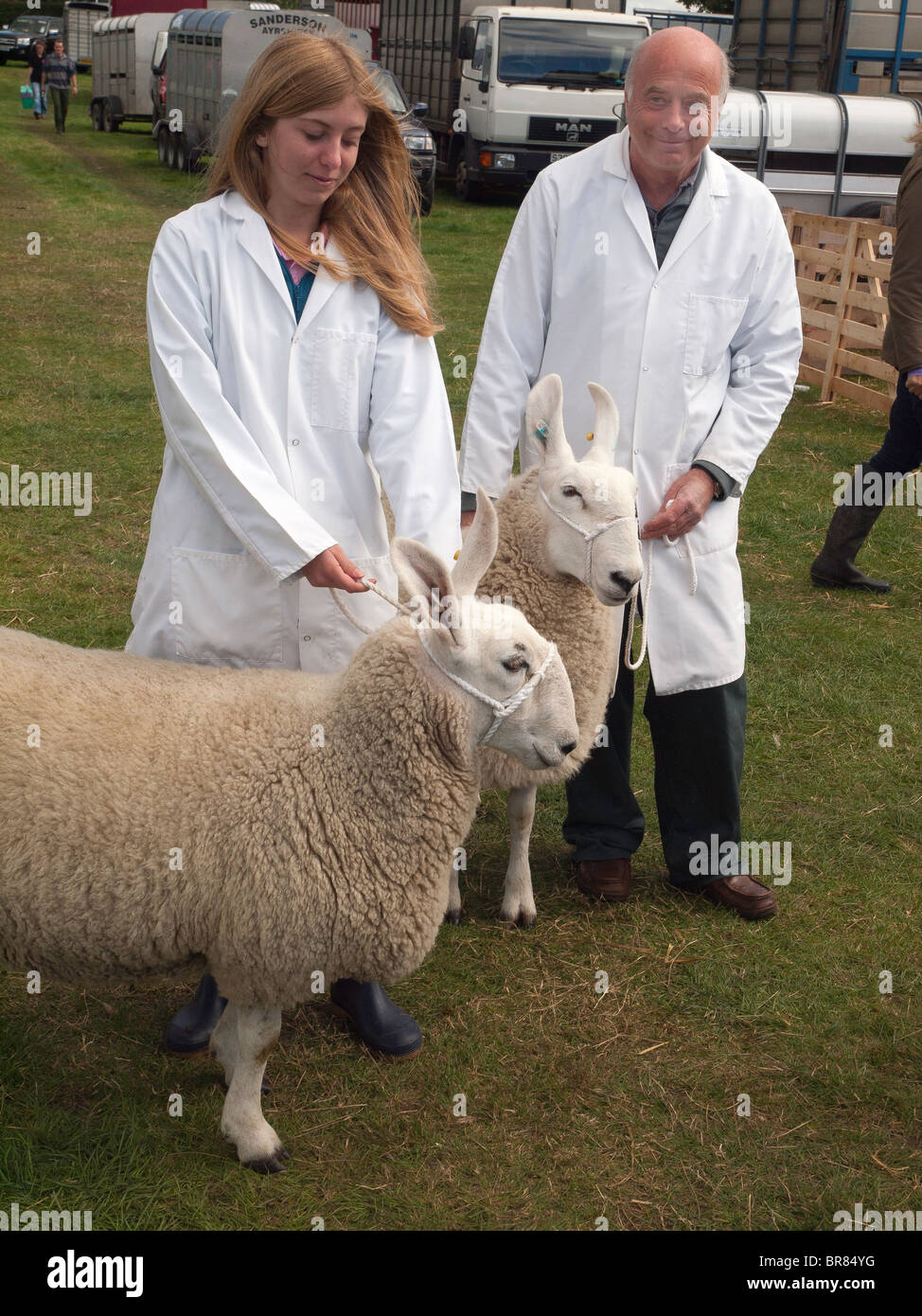 Proud man and woman showing off their sheep at the Stokesley ...