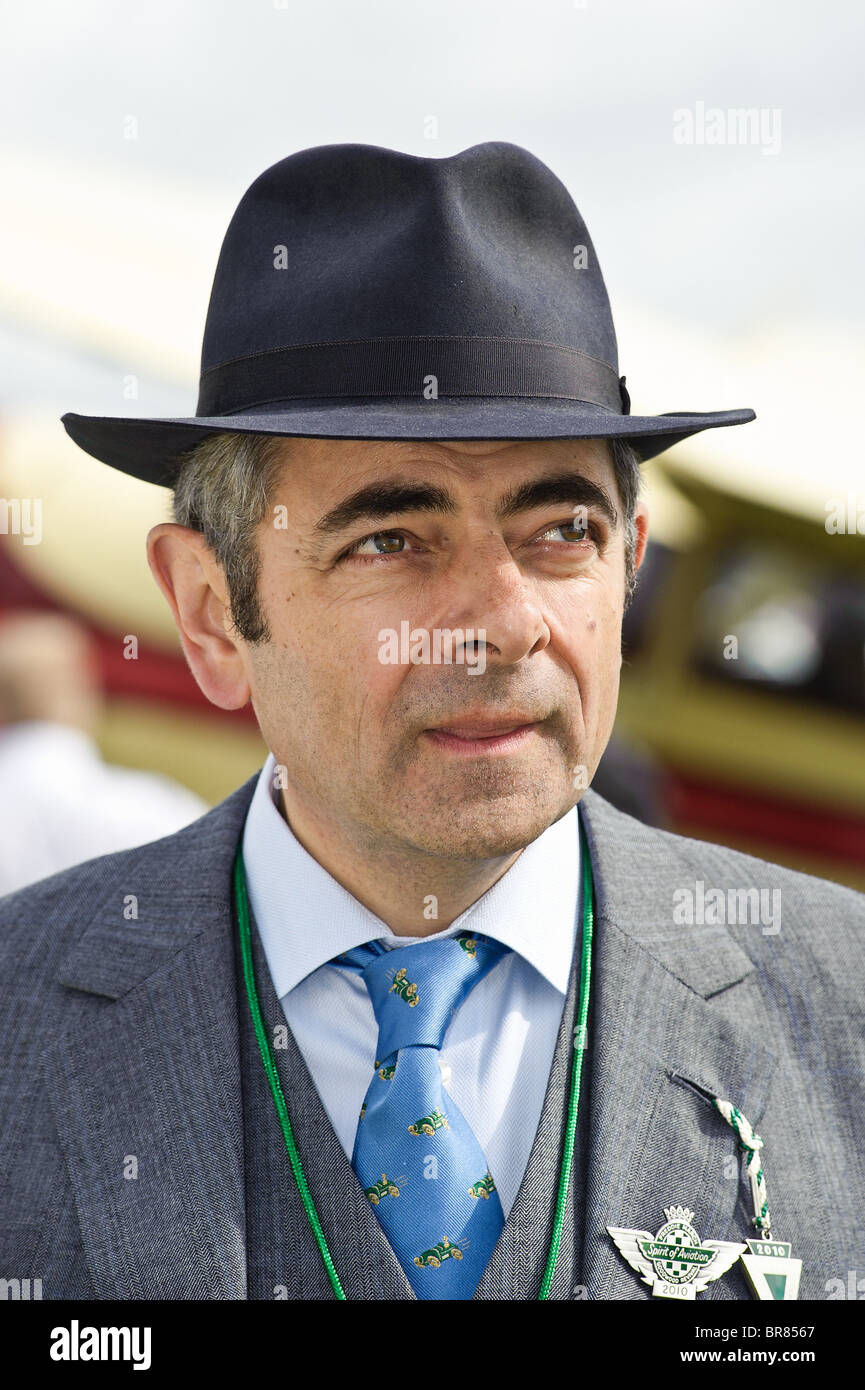 Rowan Atkinson judges the airplane display at The Goodwood Revival 2010 ...