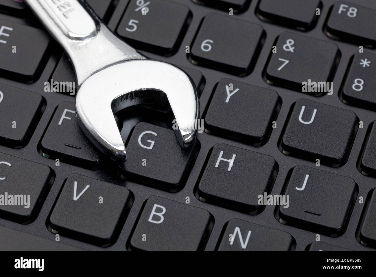 Computer Keyboard and Wrench, concept of IT Support Stock Photo - Alamy