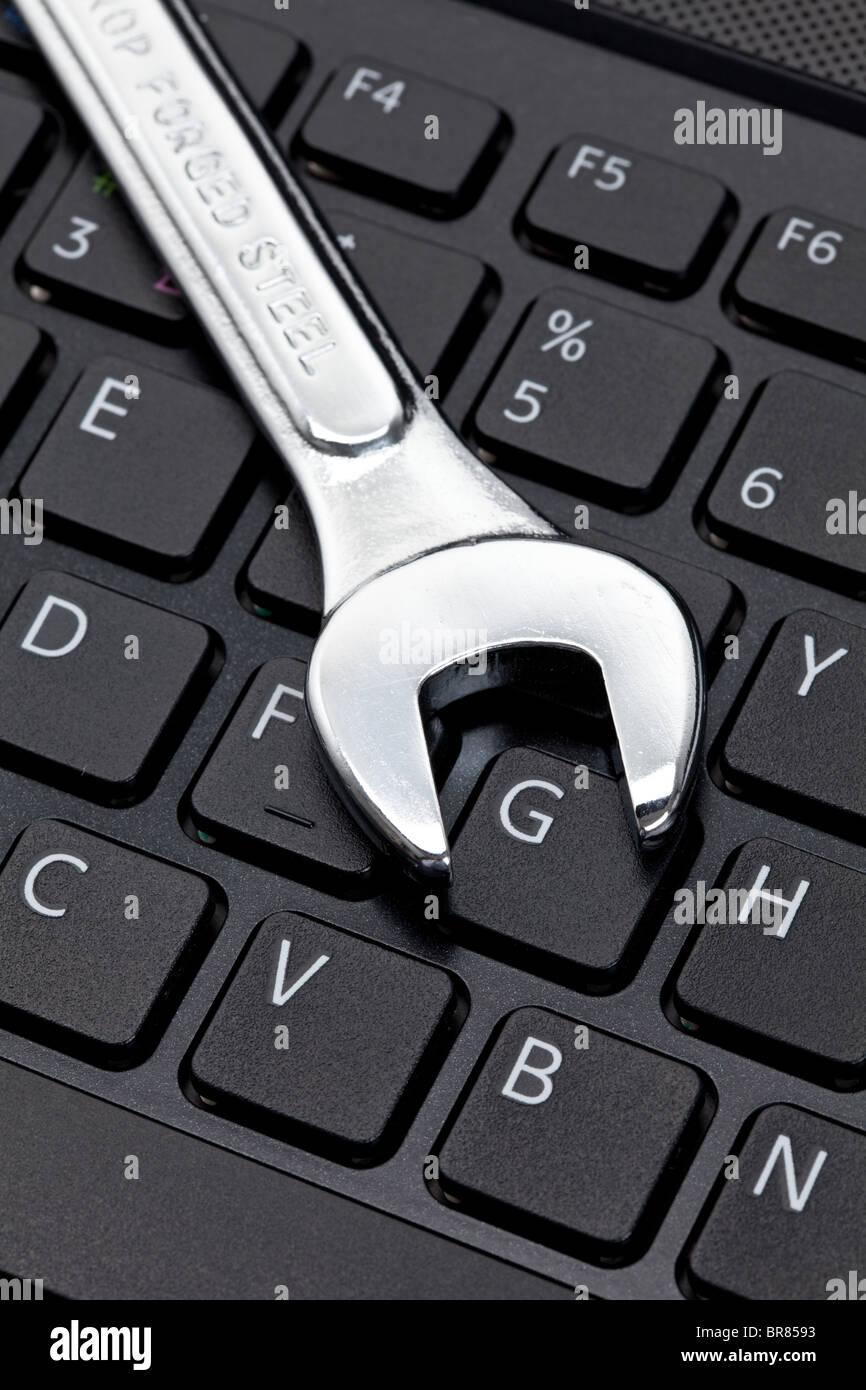 Computer Keyboard and Wrench, concept of IT Support Stock Photo - Alamy