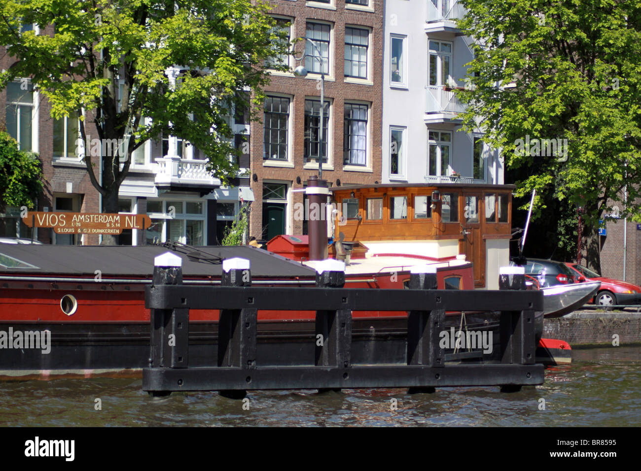 Amsterdam canal boat trees hi-res stock photography and images - Alamy