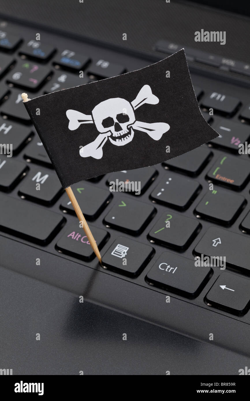 Pirate Flag and Computer Keyboard, concept of Computer Hacker Stock ...