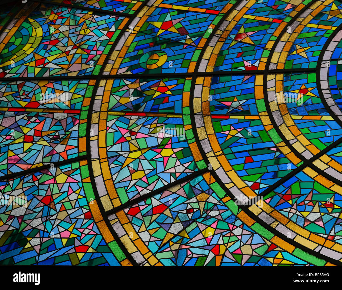 Section of a colorful circular stained glass window in Prague, Czech ...
