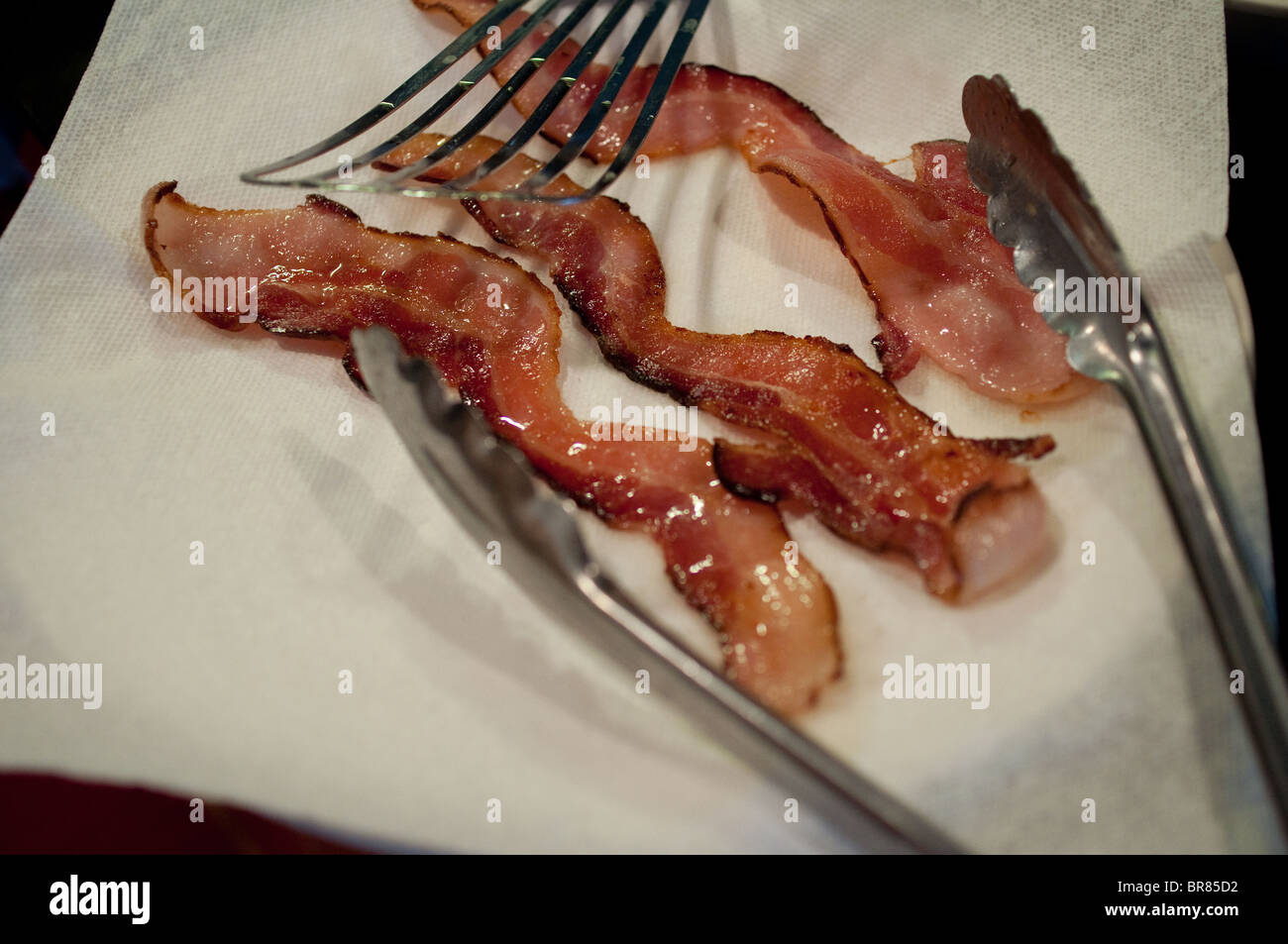 Cooked breakfast bacon Stock Photo - Alamy
