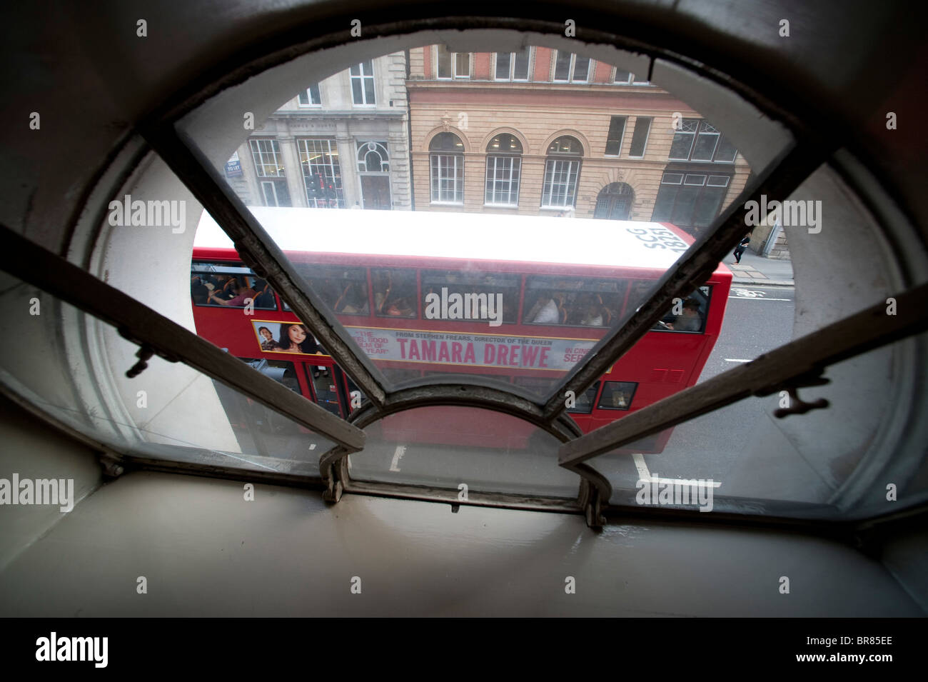 London Bus through window Stock Photo - Alamy