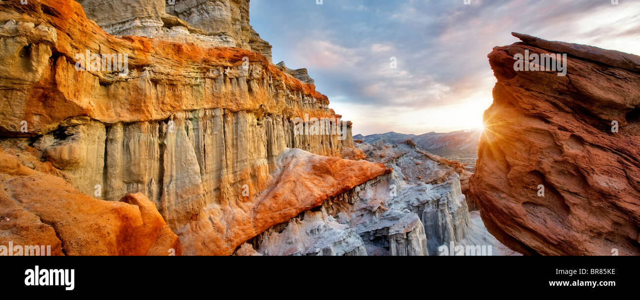 Puffy clouds and colorful sandstone rocks at Red Rock Canyon State Park ...