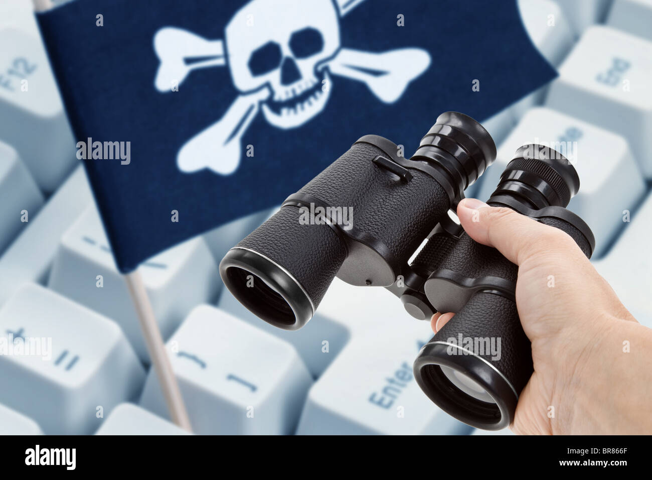 Binoculars and Pirate Flag, concept of Computer Hacker Stock Photo - Alamy