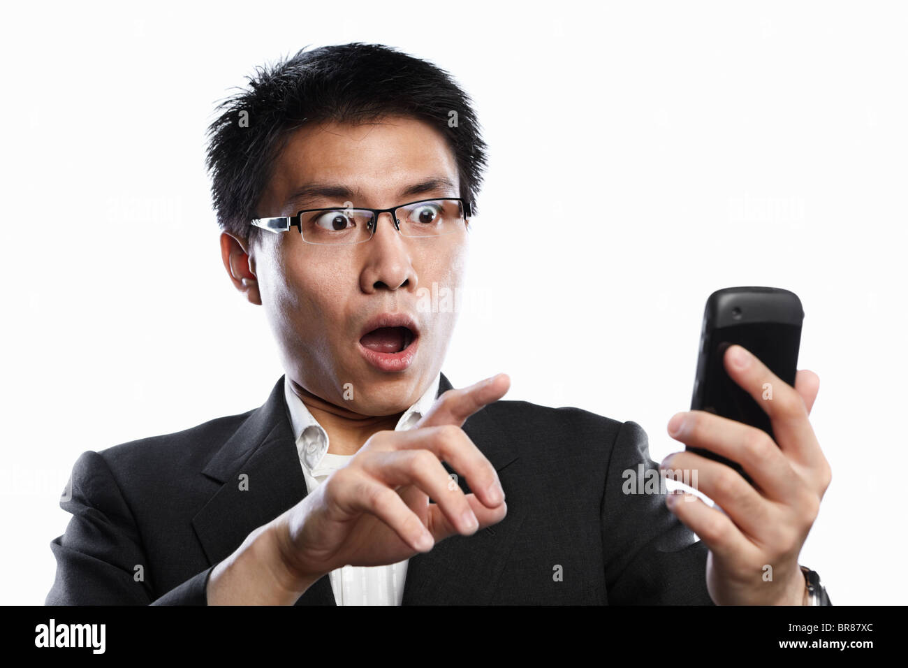 Chinese businessman surprised expression when using video call ...