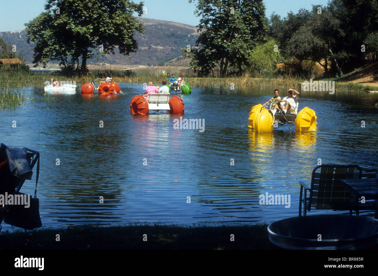 paddle wheel pedal boat fun recreation sport park lake race sun water ...