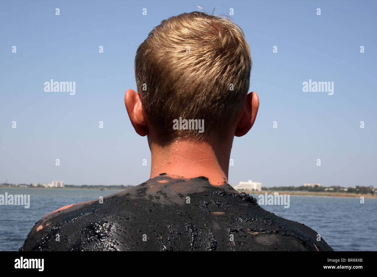 Young man covered in mud hi-res stock photography and images - Alamy