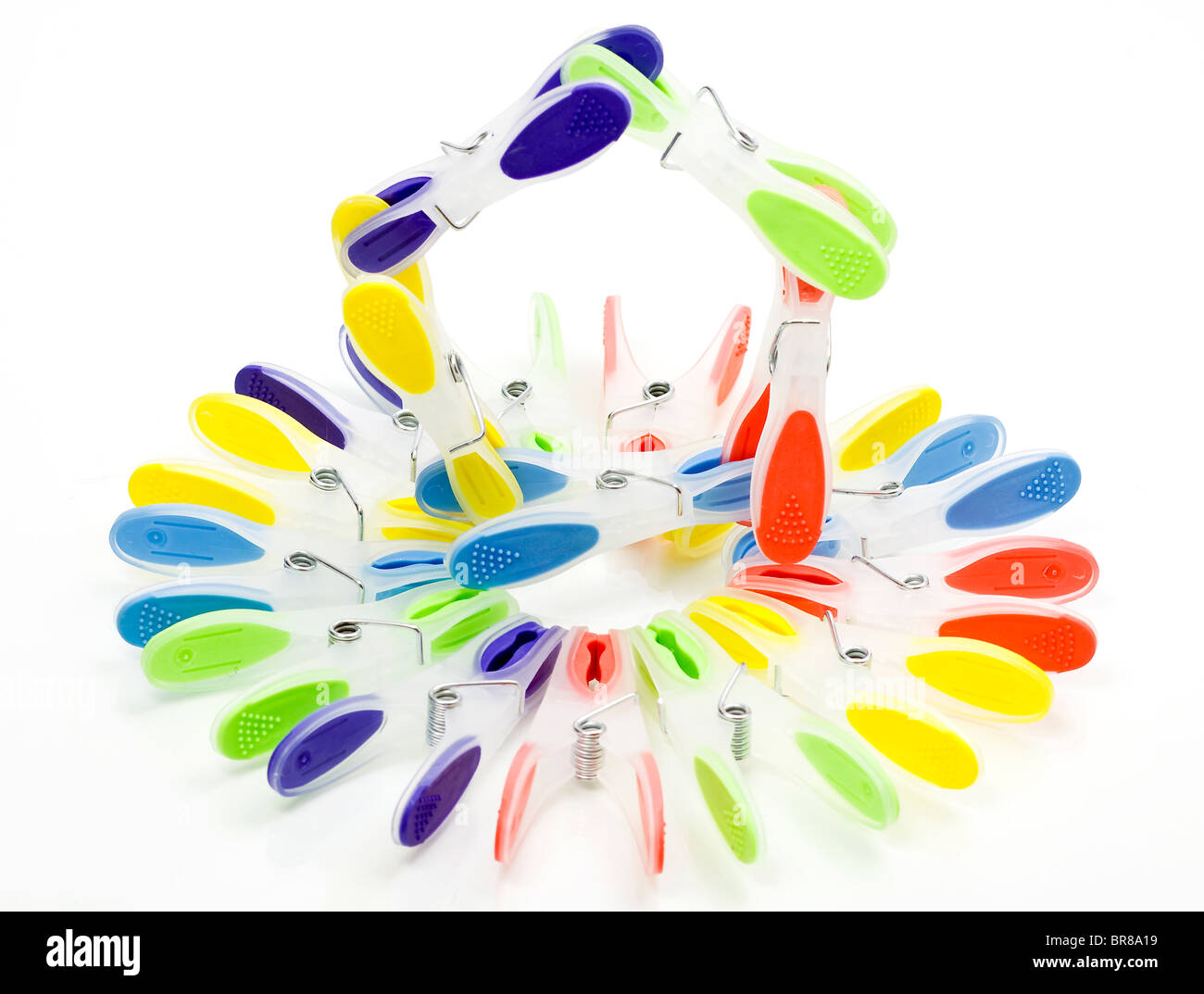 Colorful clothespins isolated on white background Stock Photo - Alamy