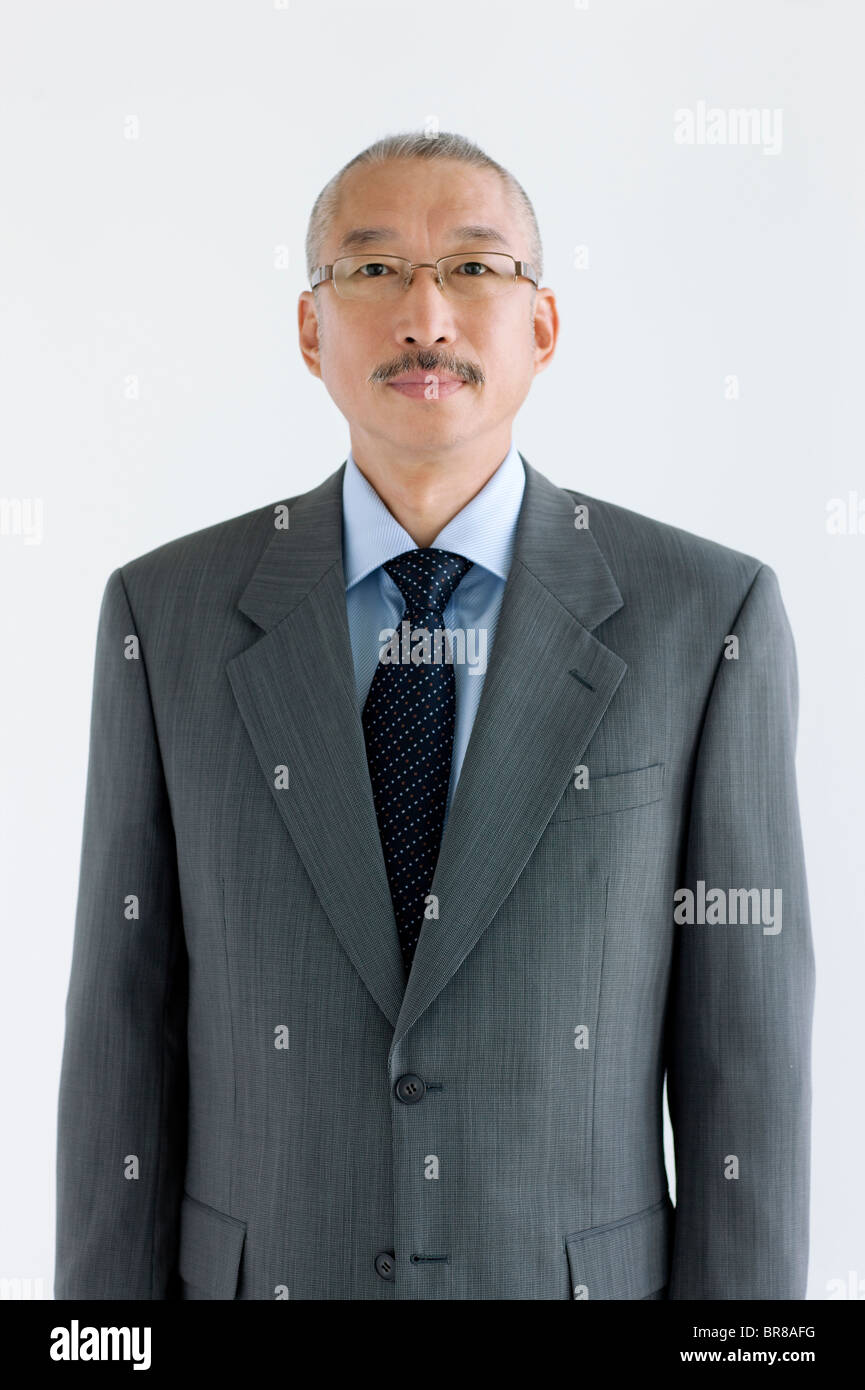 Portrait of businessman, white background Stock Photo - Alamy