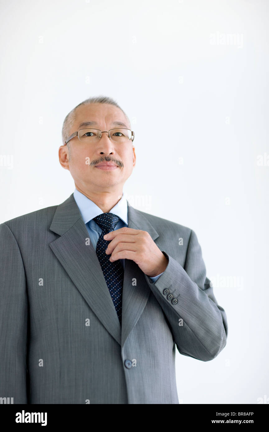 Portrait of businessman, white background Stock Photo - Alamy