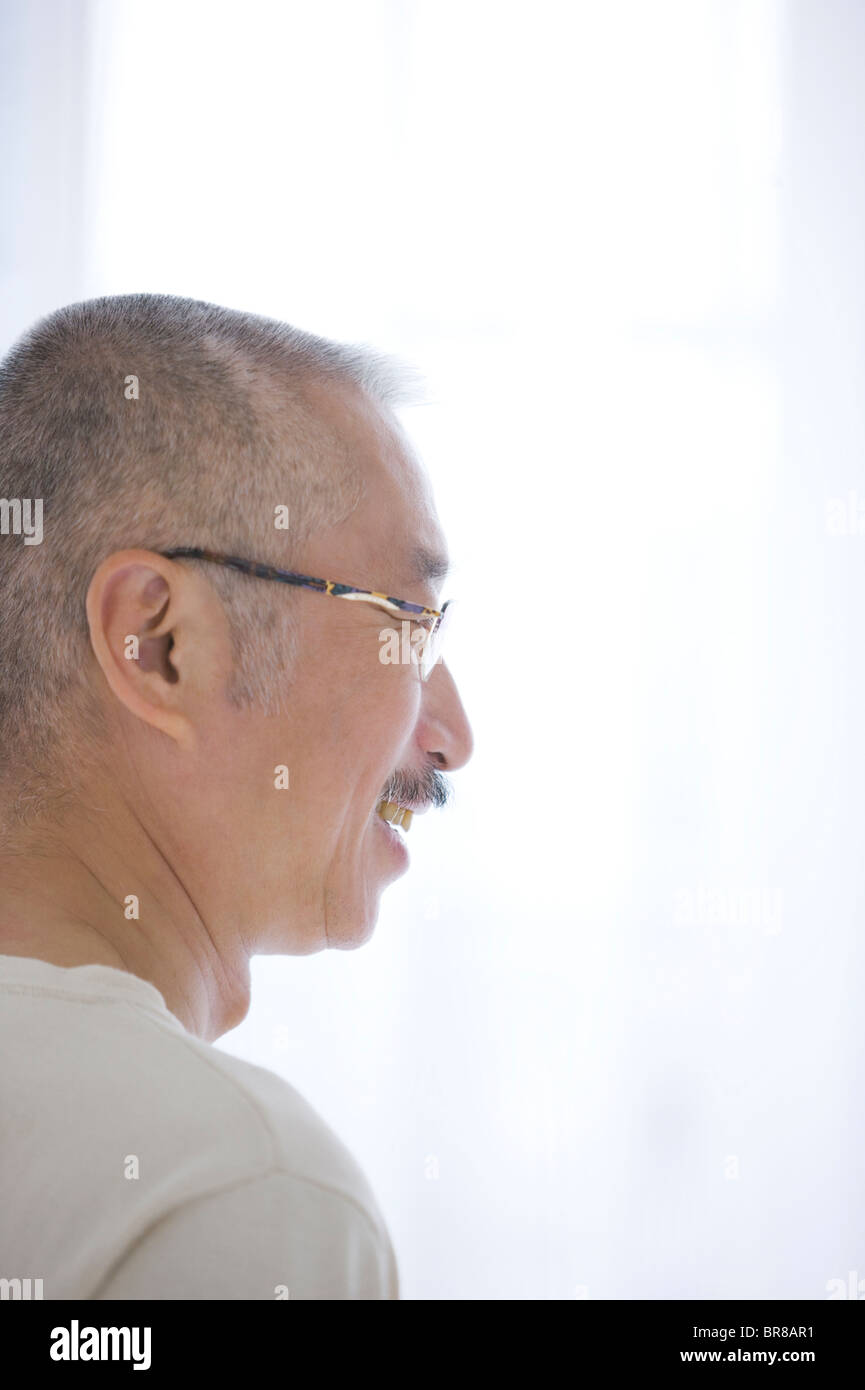 Mature man smiling Stock Photo - Alamy