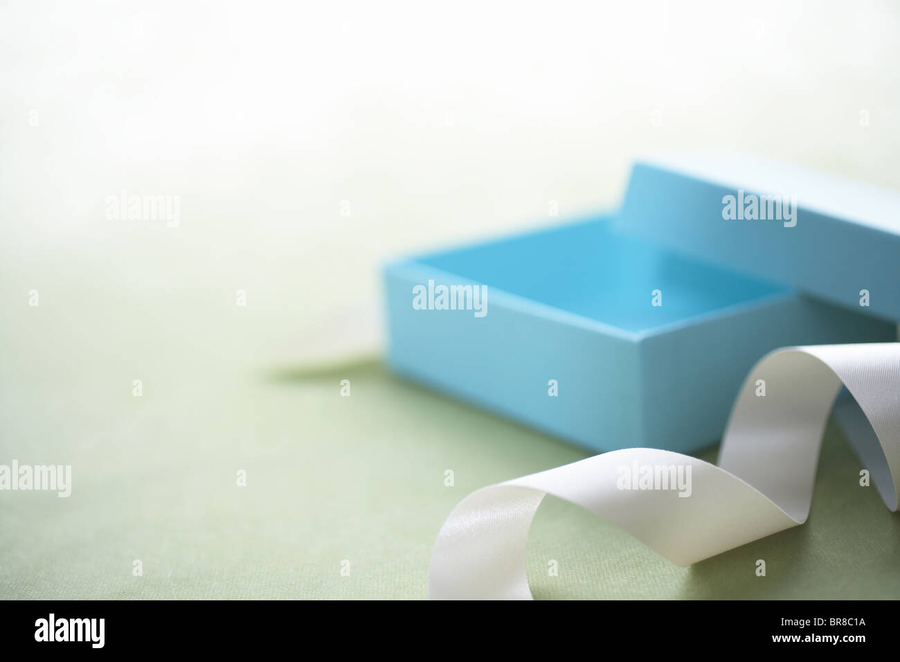 Opened gift box Stock Photo - Alamy