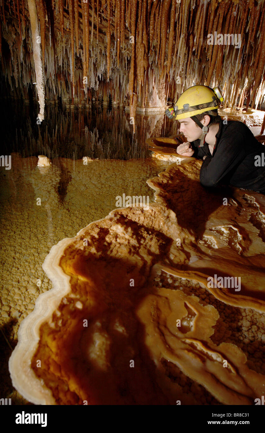 Cave explorer admires pretty Gour Pool at the most remote part of the ...