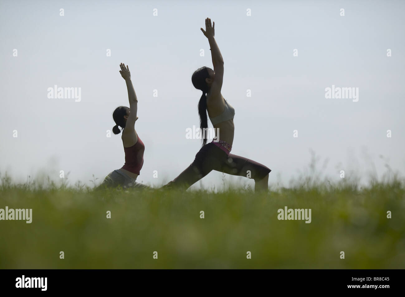 Two people doing stretching hi-res stock photography and images - Alamy