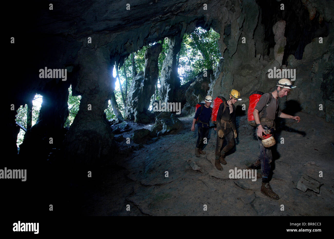 A team of three cave explorers make their way into the entrance series ...