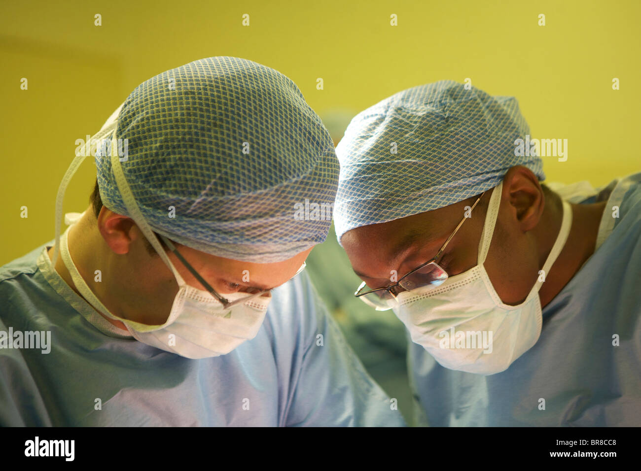 close ups of two surgeons during an operation Stock Photo - Alamy