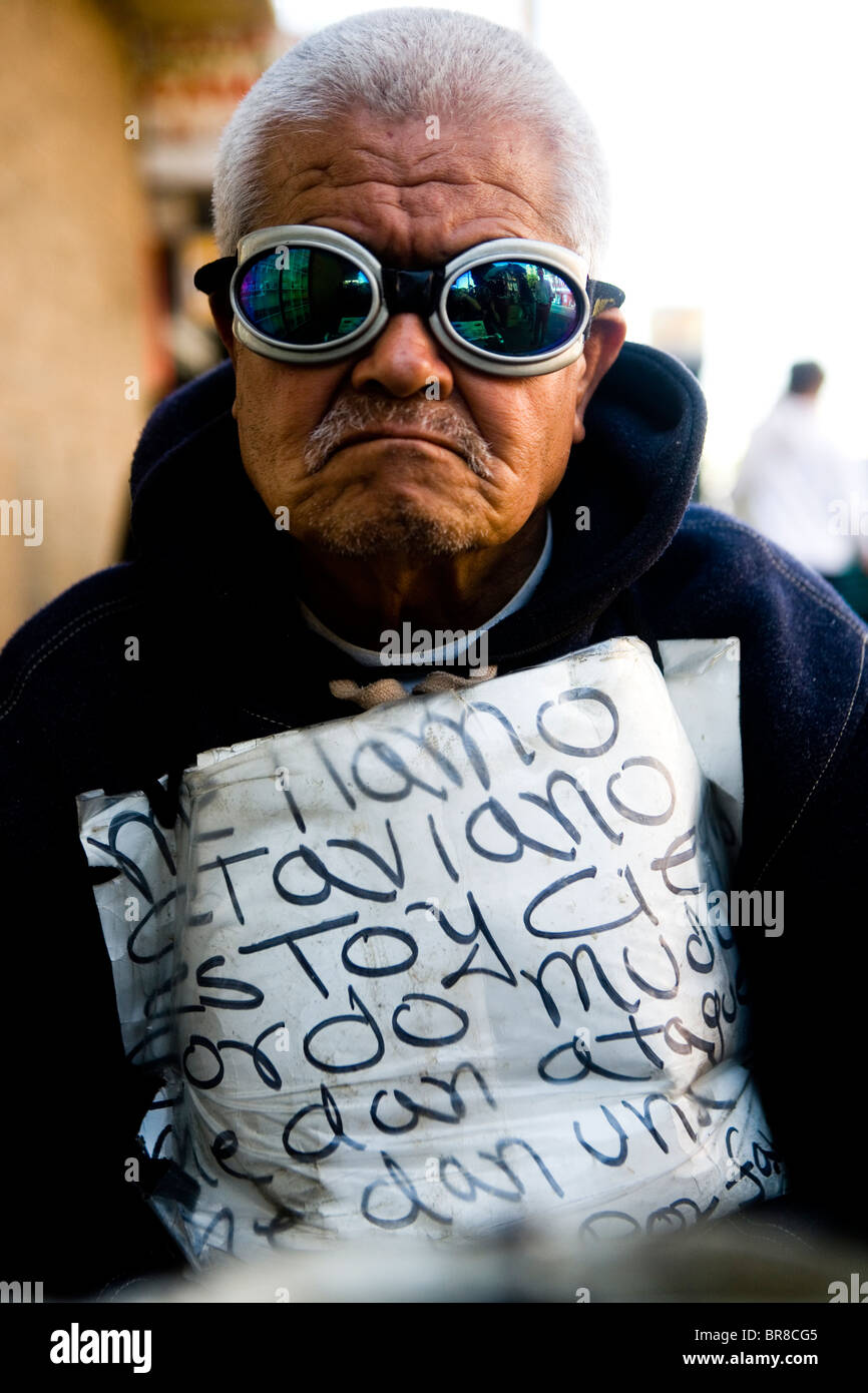 An old man begging in the street of Tijuana BC Mexico Stock Photo - Alamy