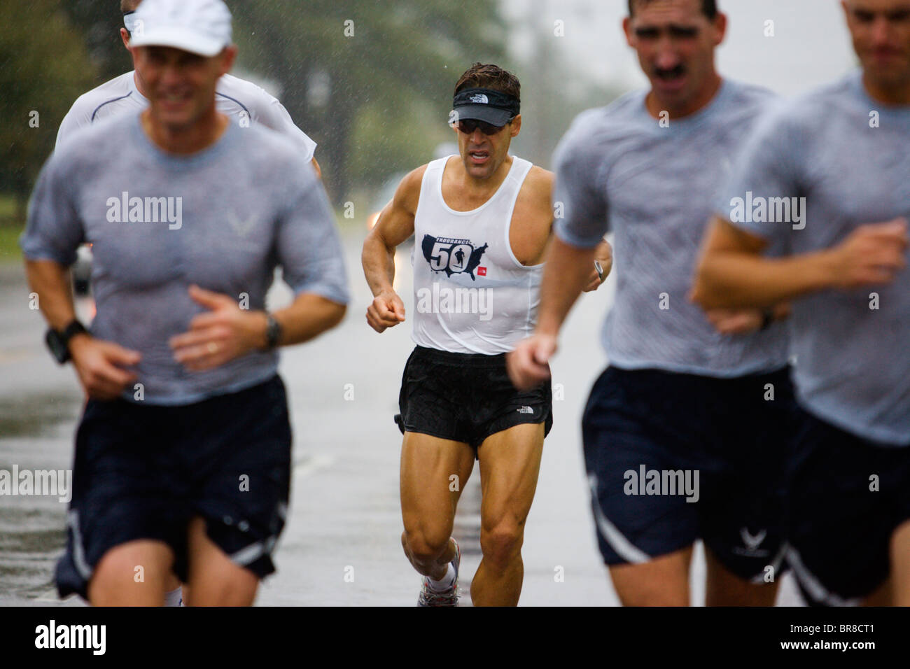 Marathon and rain hi-res stock photography and images - Alamy