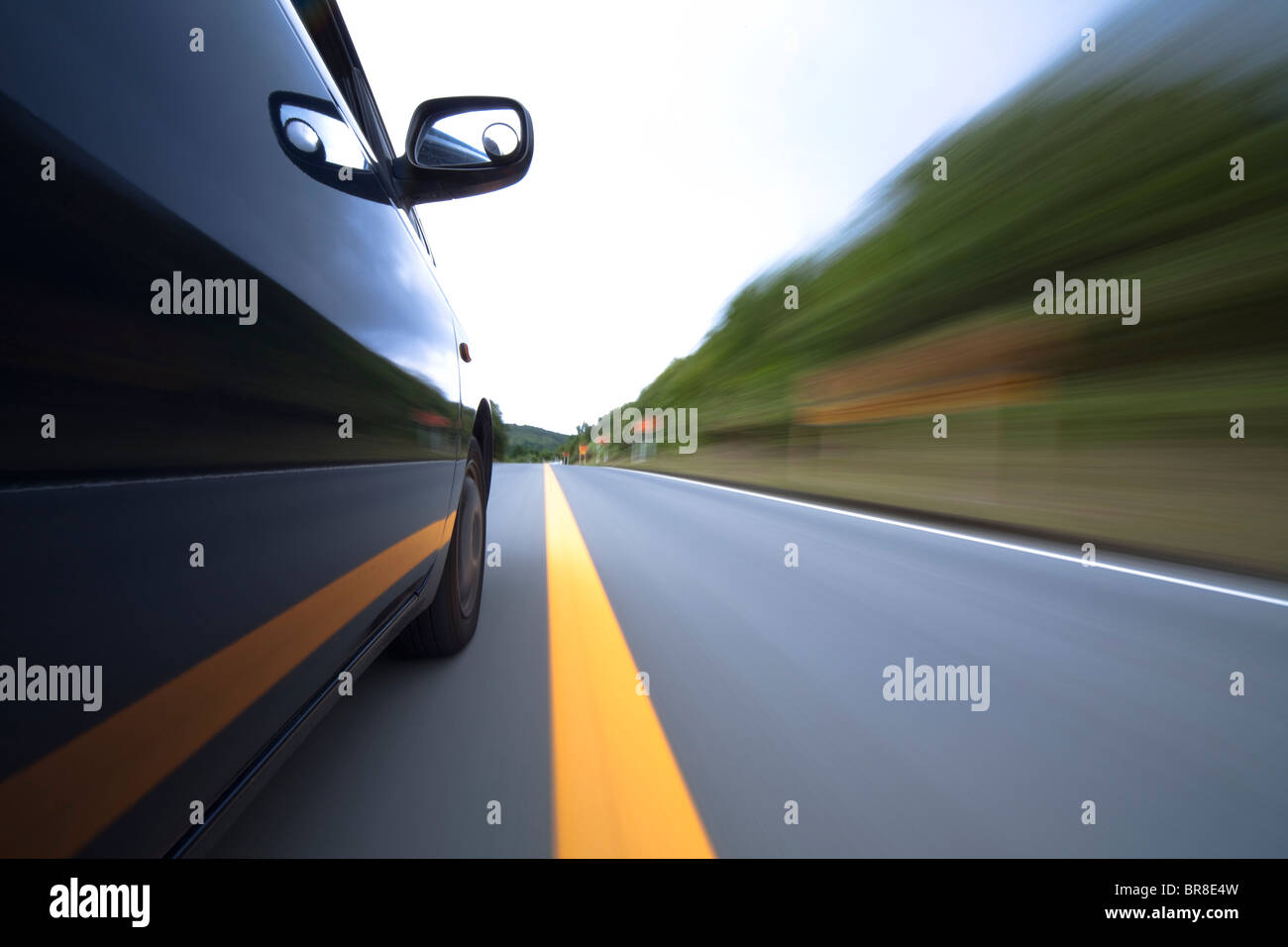 Car driving on road Stock Photo - Alamy