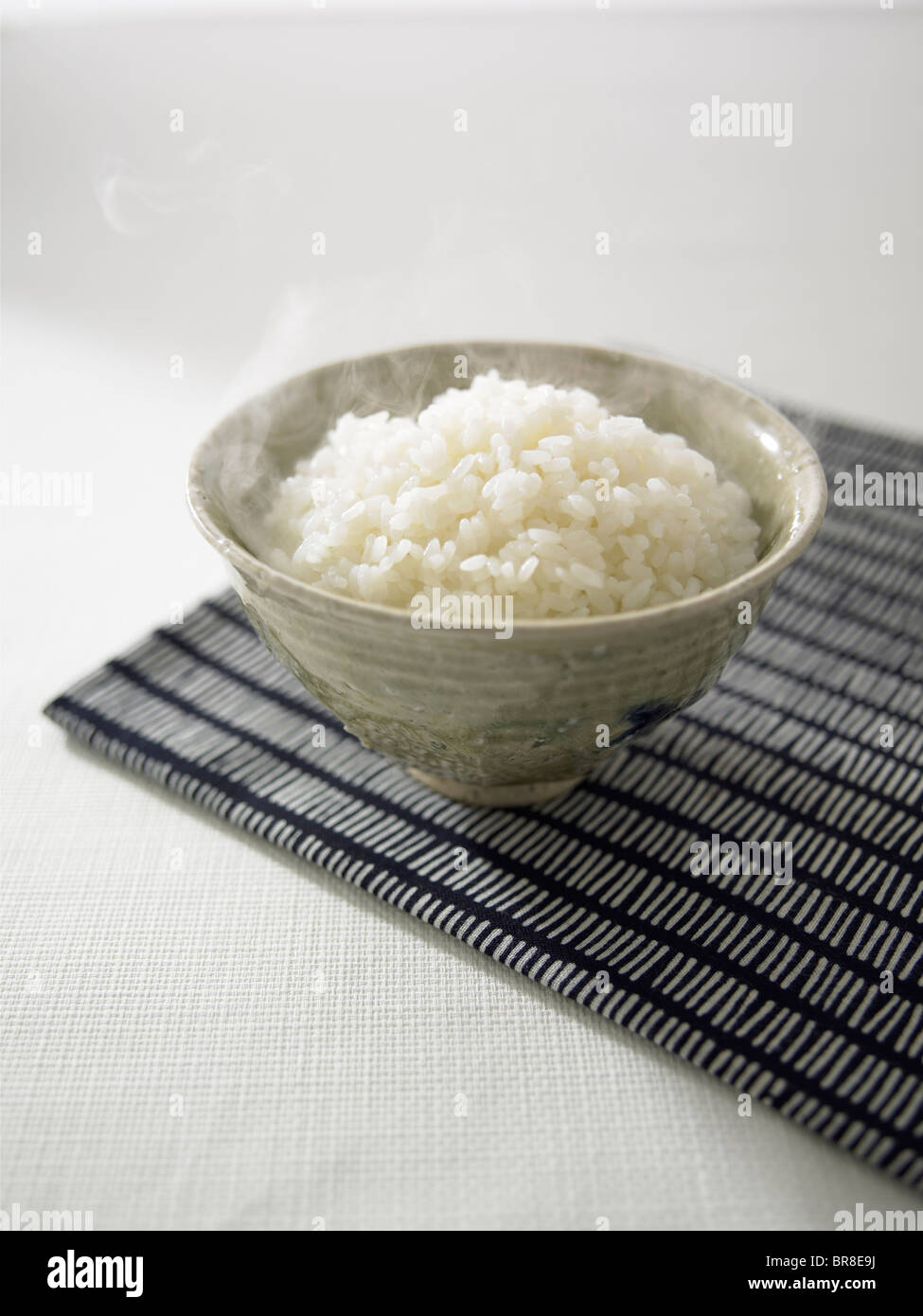 Steamed rice in bowl Stock Photo - Alamy