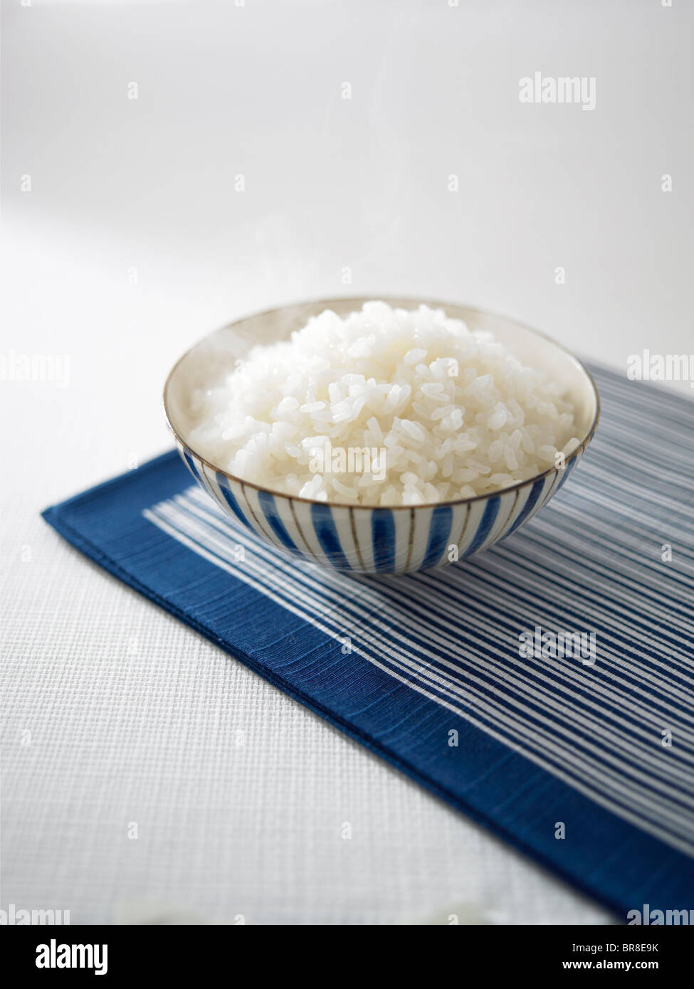 Steamed rice in bowl Stock Photo - Alamy