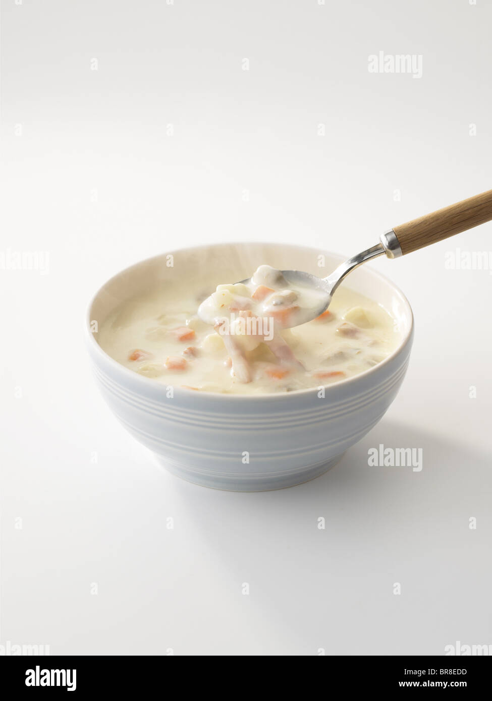Bowl of chowder, white background Stock Photo - Alamy