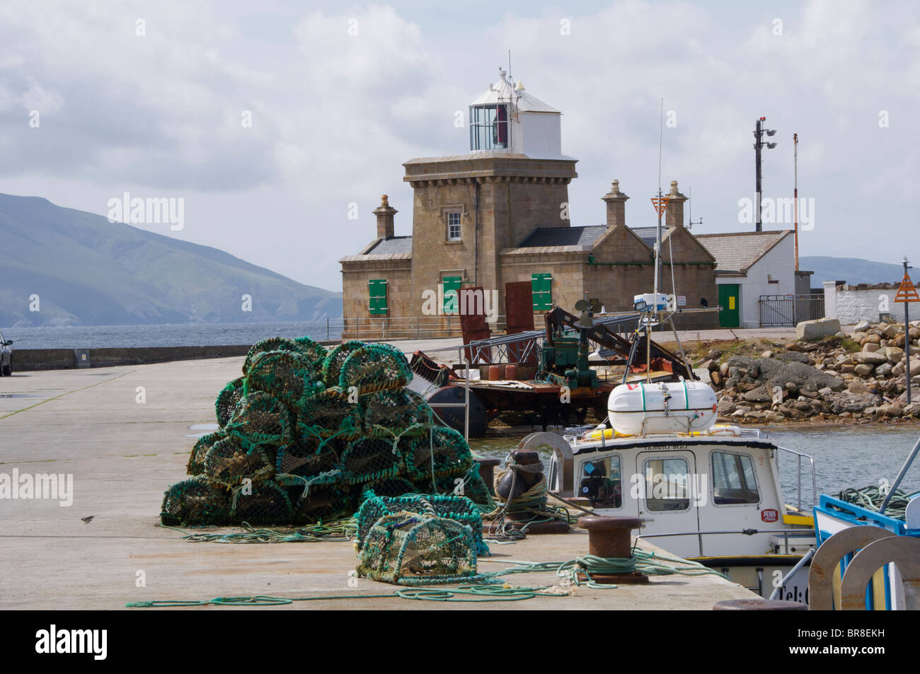 Blacksod pier with blacksod lighthouse in the background, The Erris ...