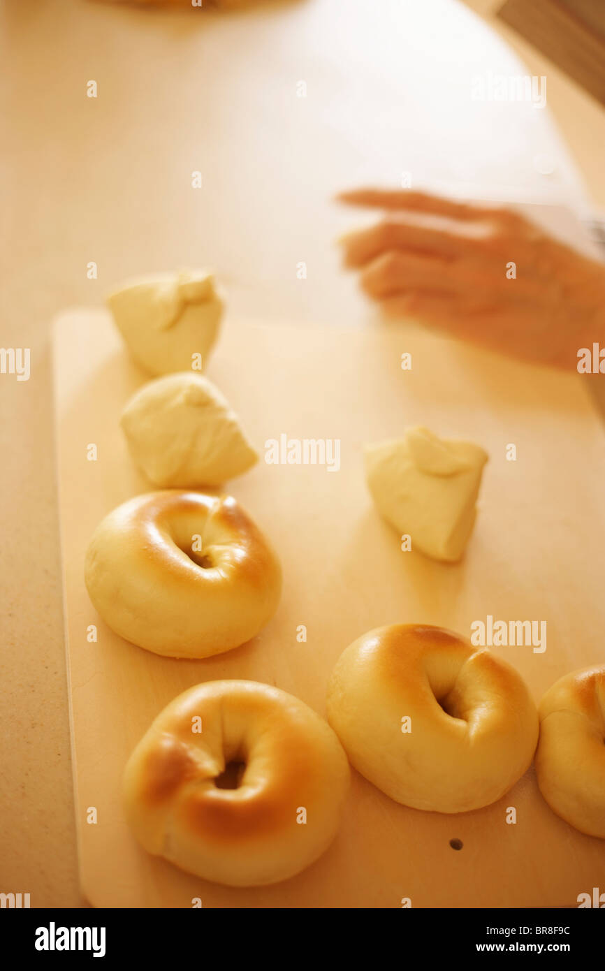 Woman making bagels, close up Stock Photo - Alamy