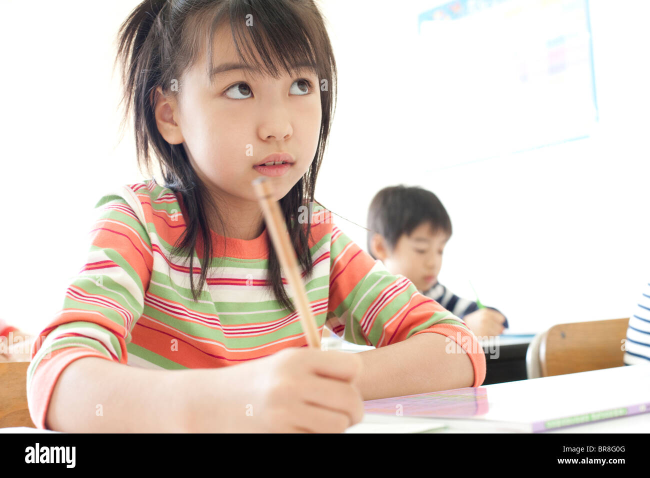 Children studying at cram school Stock Photo - Alamy