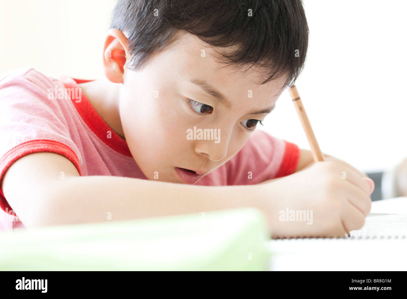 Boy studying at cram school Stock Photo - Alamy