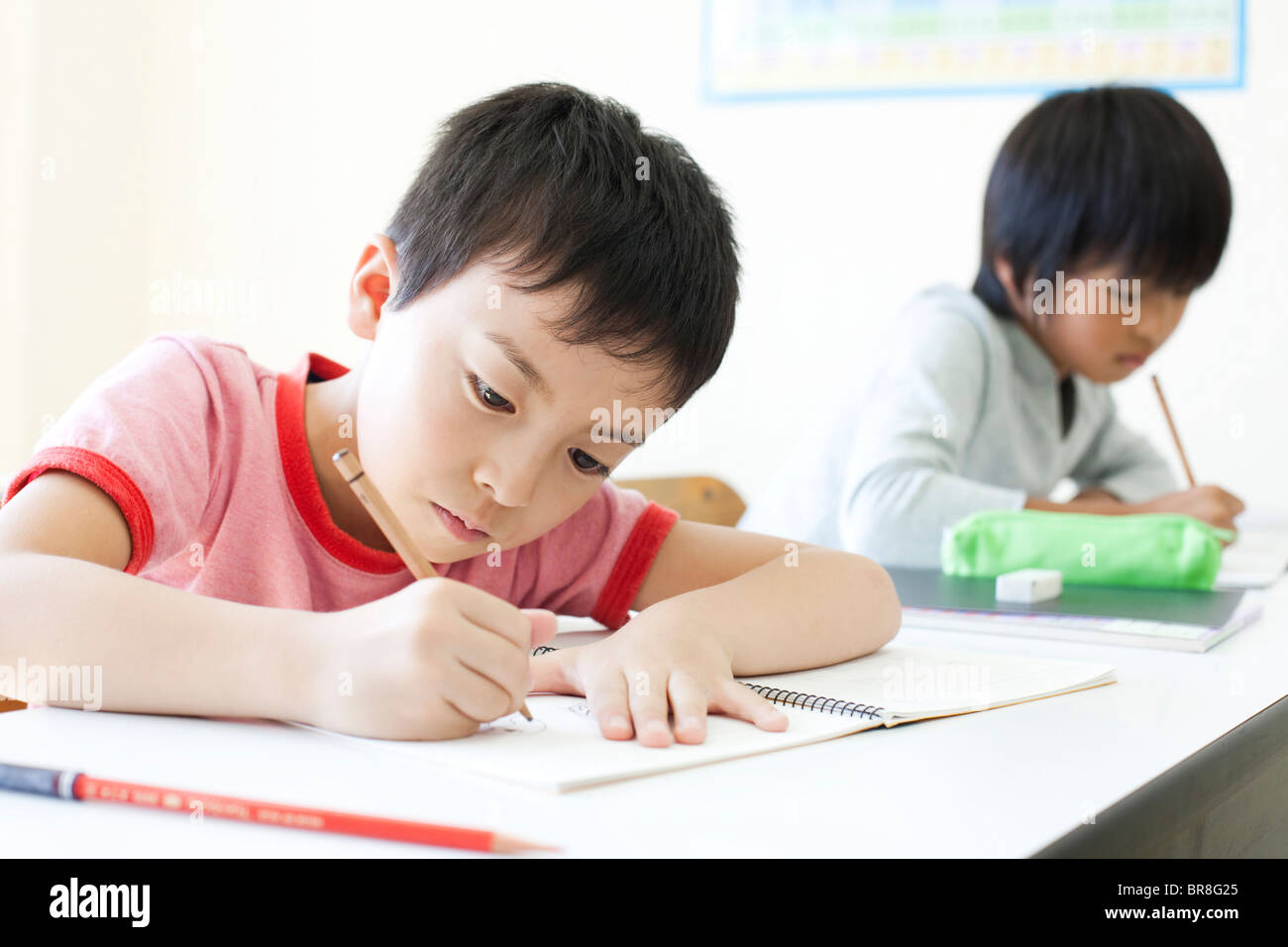 Boys studying at cram school Stock Photo - Alamy