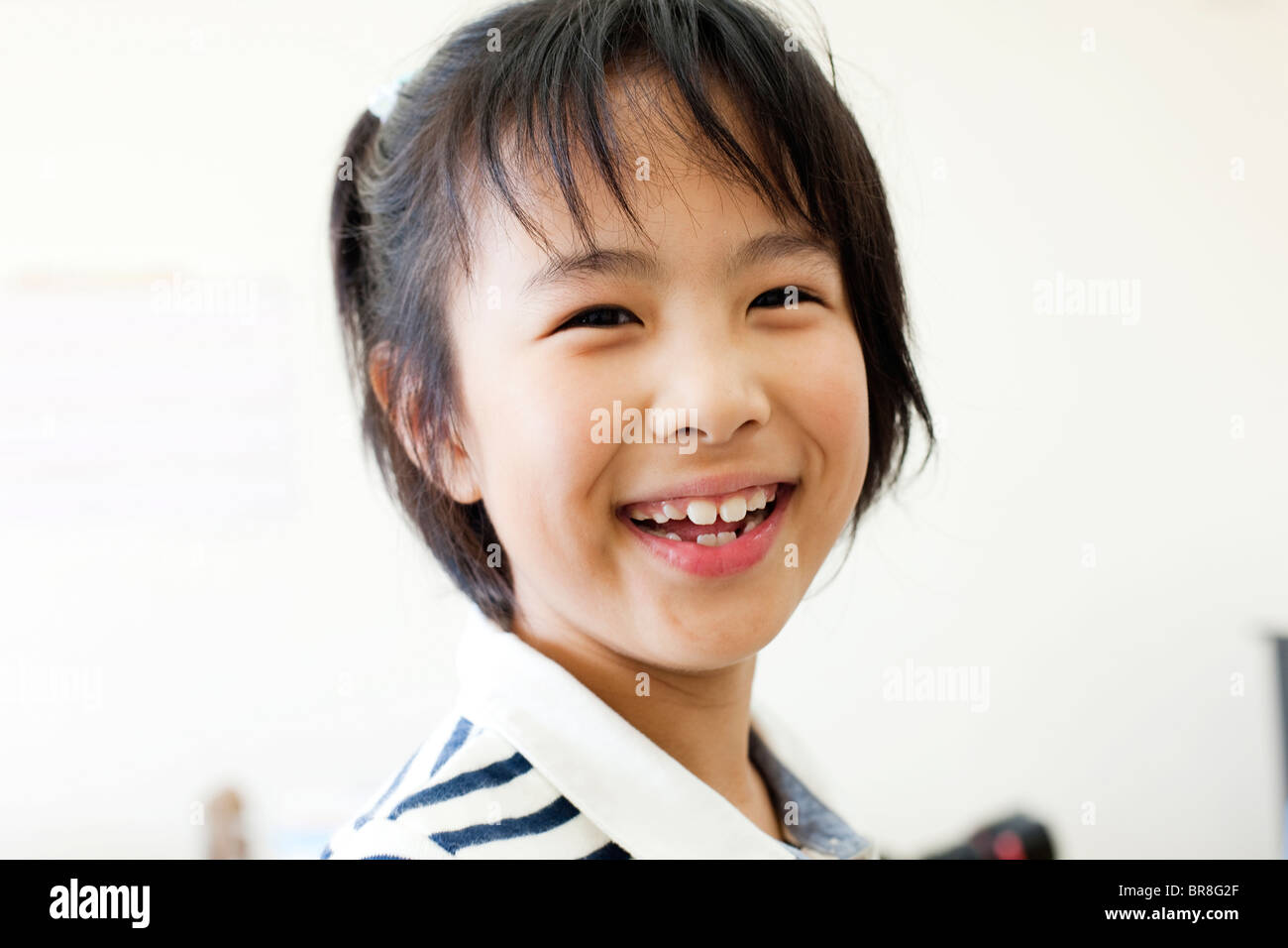 Portrait of smiling girl Stock Photo - Alamy
