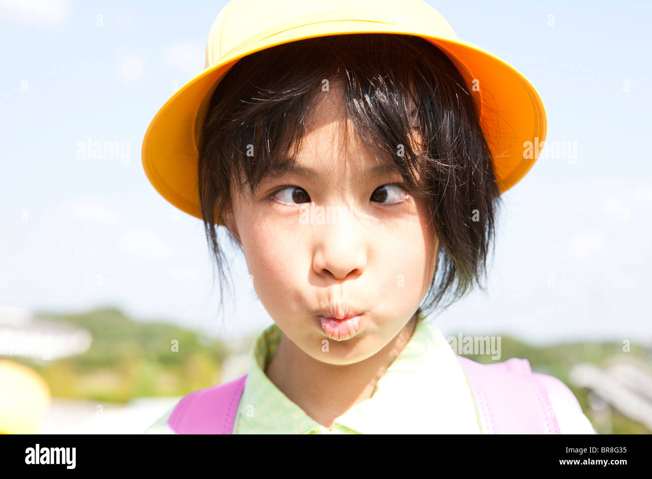 Girl making a face Stock Photo - Alamy