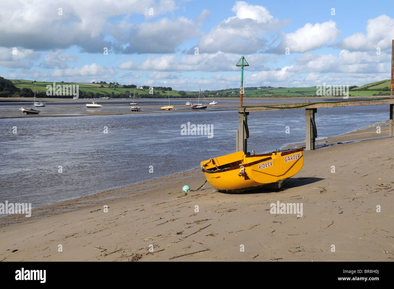 Small fishing boat on the Tywi Estuary at Ferryside Carmarthenshire ...