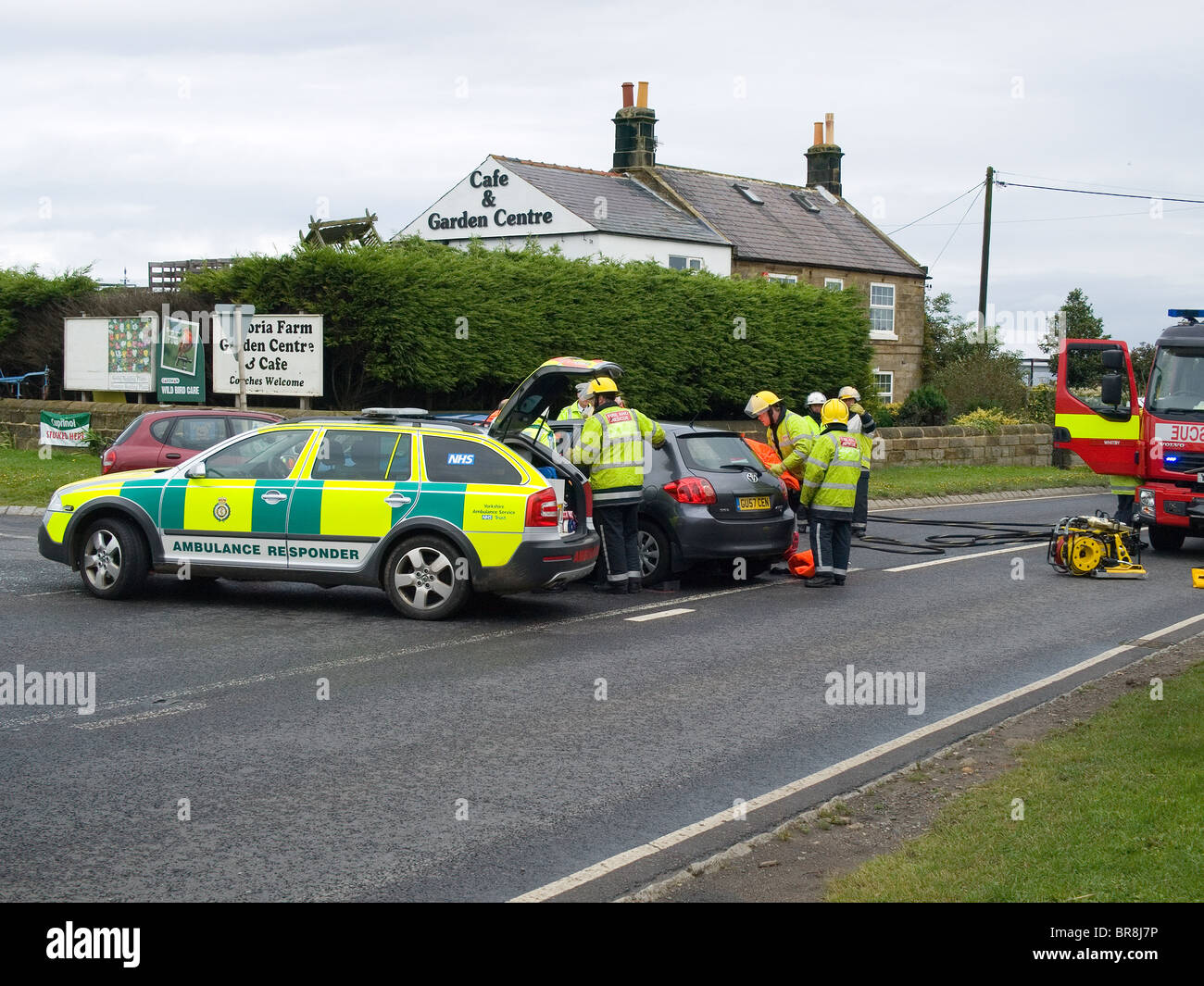 Emergency services work to rescue people from a multiple car crash ...
