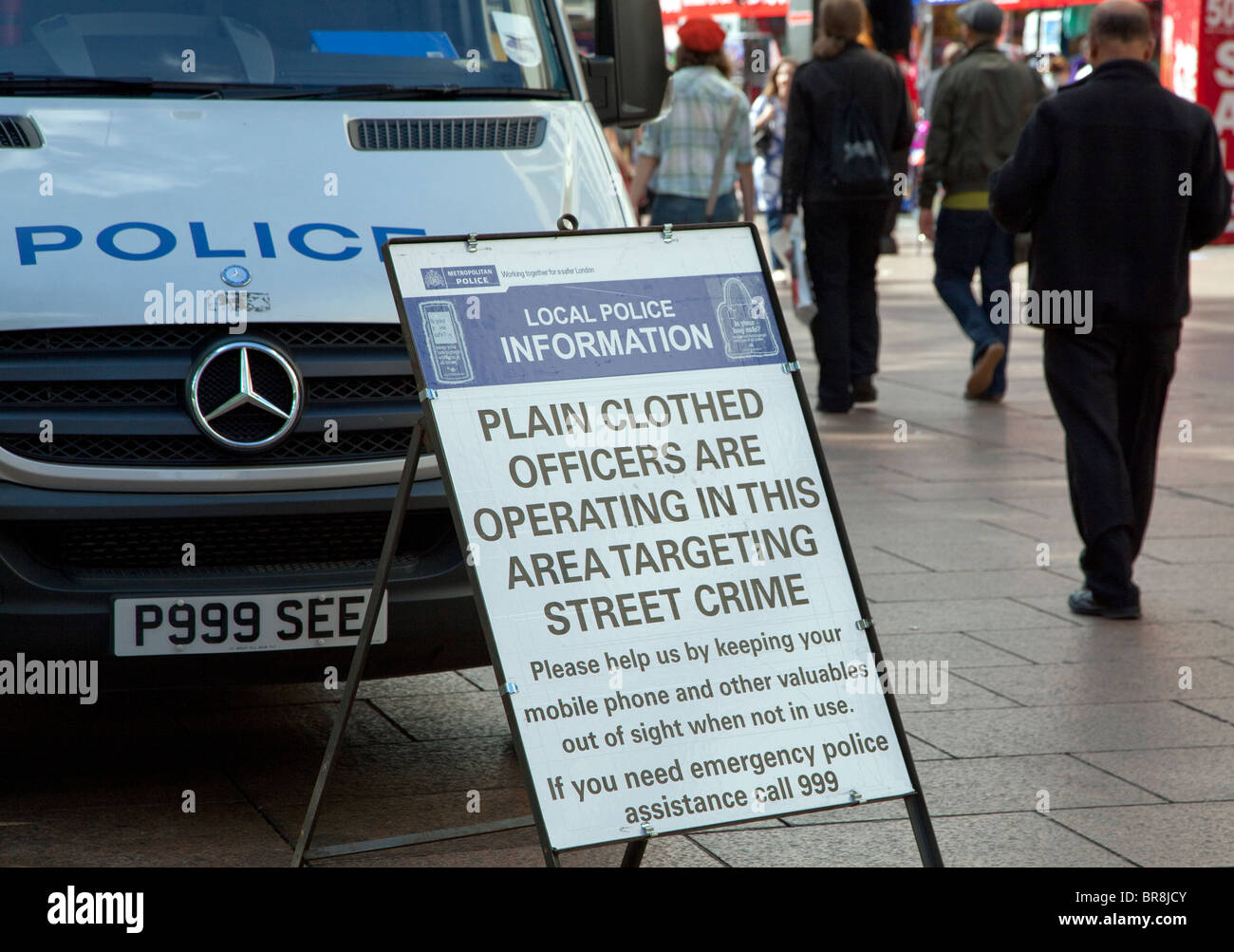 Police street crime warning sign in Leicester Square, London Stock ...