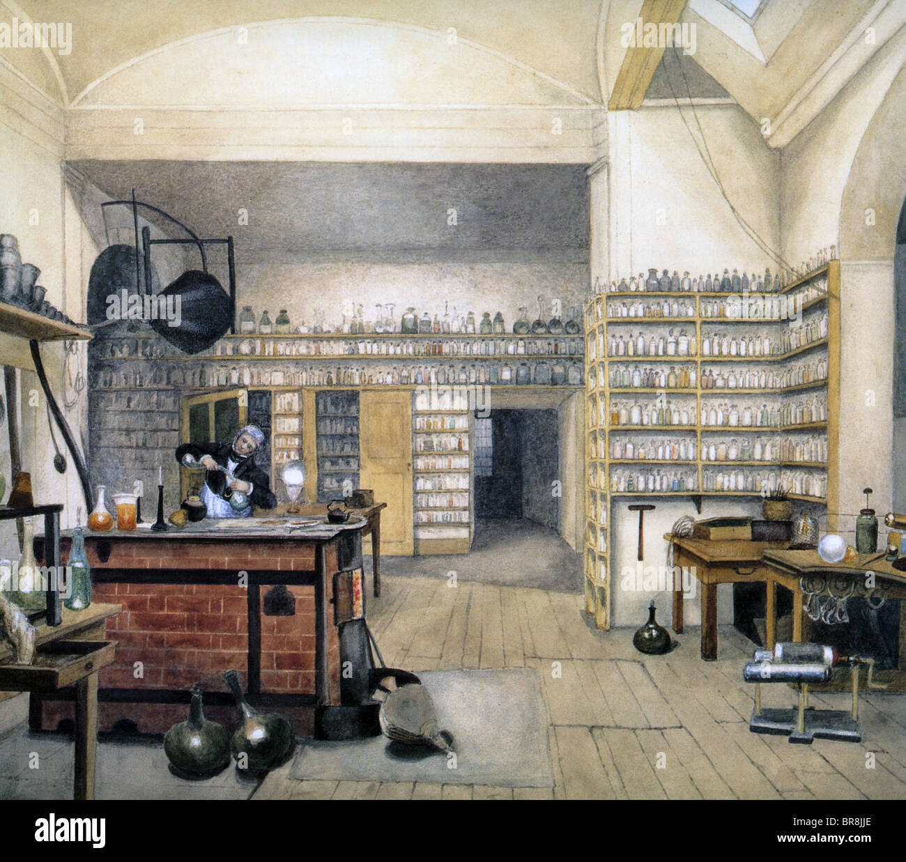 MICHAEL FARADAY (17891-1867) English chemist at work in his laboratory ...