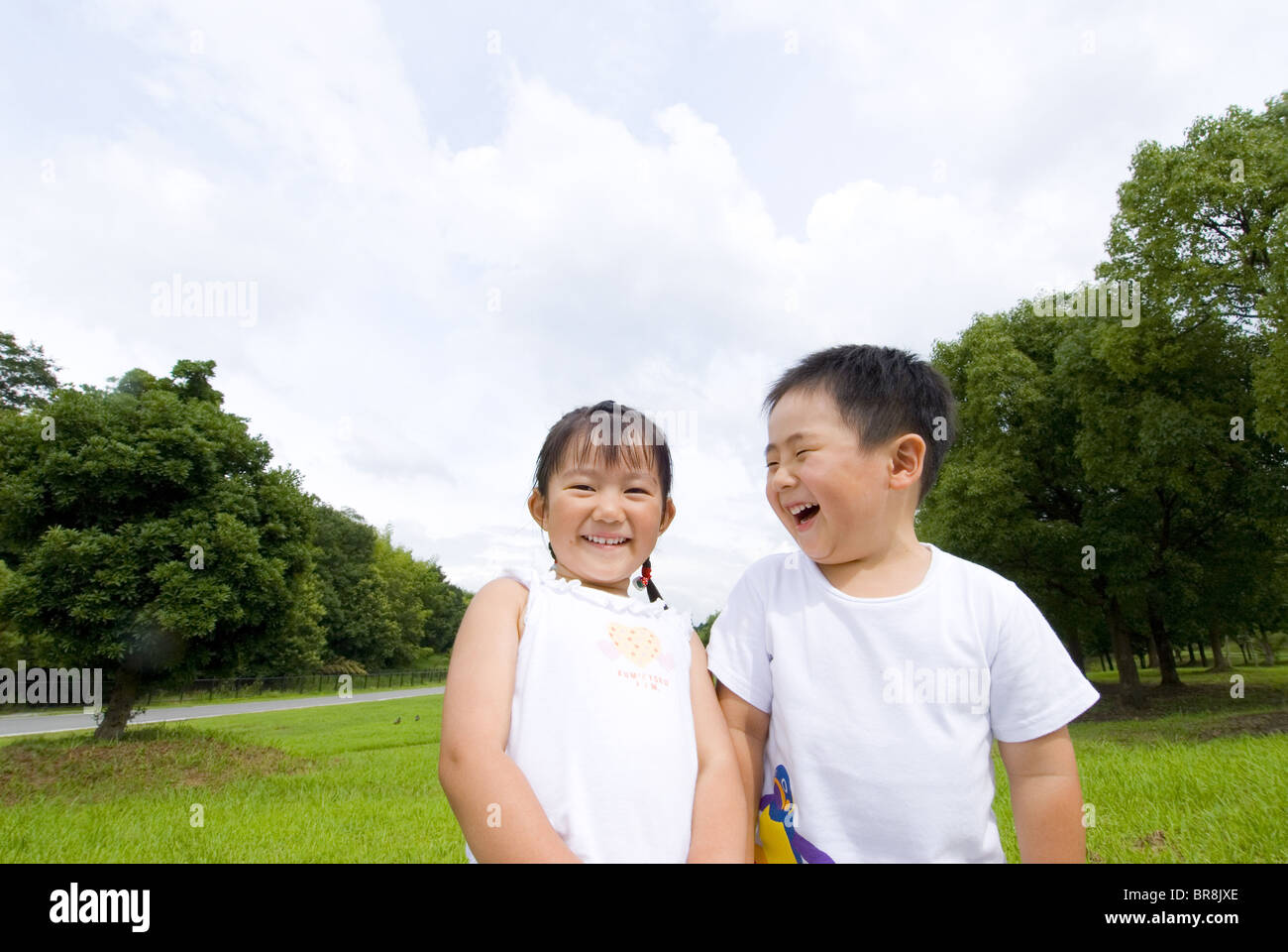 Preschool child laughing standing hi-res stock photography and images ...