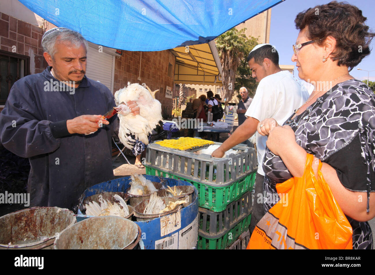 Kaparot ("atonements") is a disputed ancient Jewish ritual to save ...