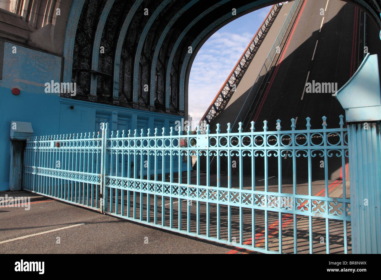 View of Tower Bridge with the road raised to allow ships to pass ...