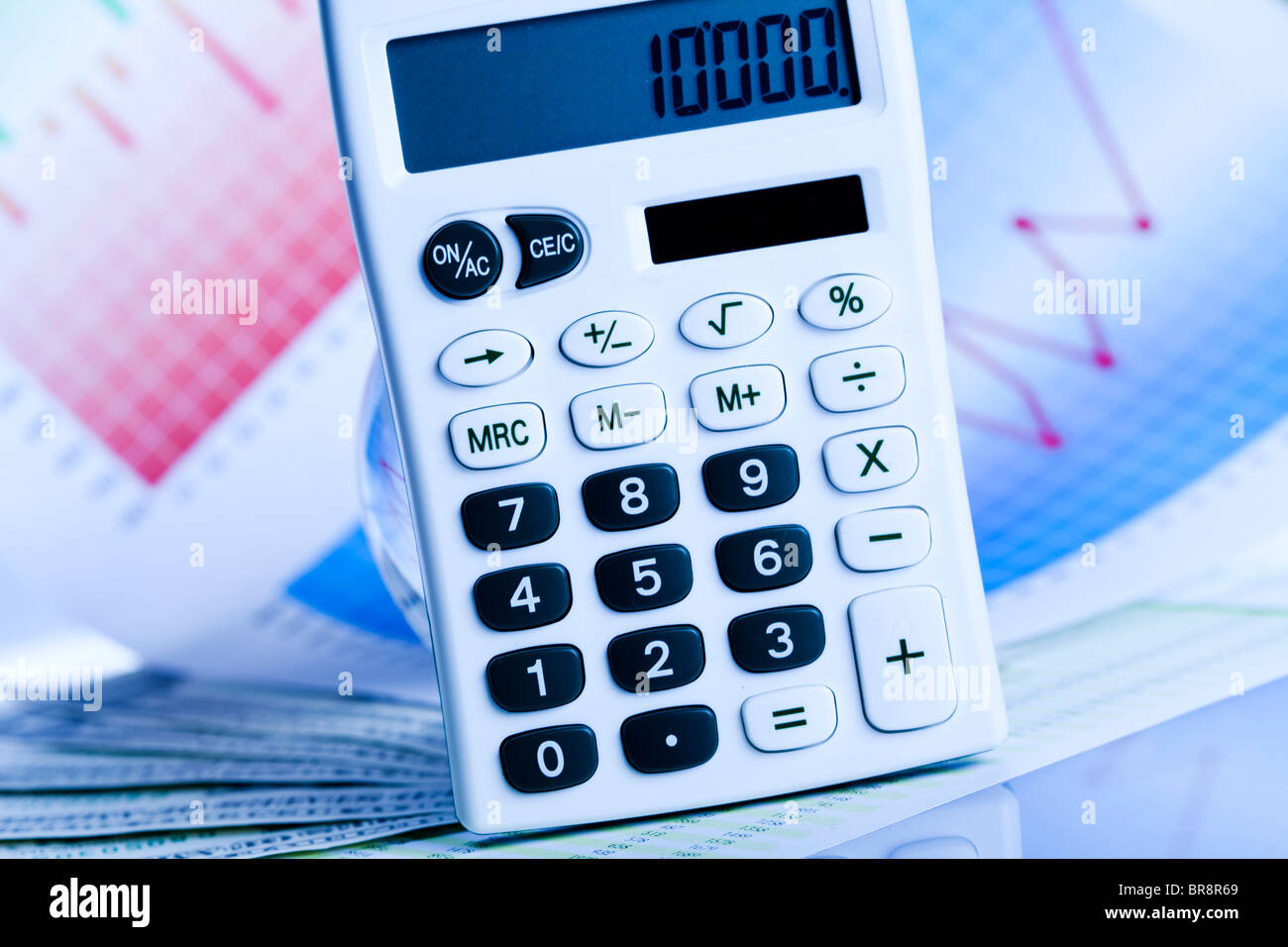 Calculator and diagram Stock Photo - Alamy