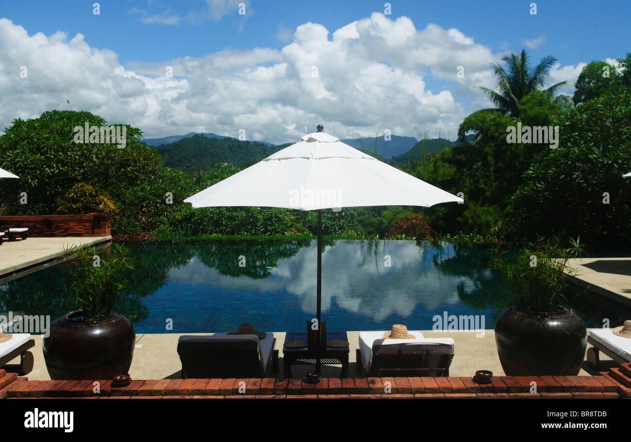 pool view at elegant French colonial style resort in Luang Prabang ...