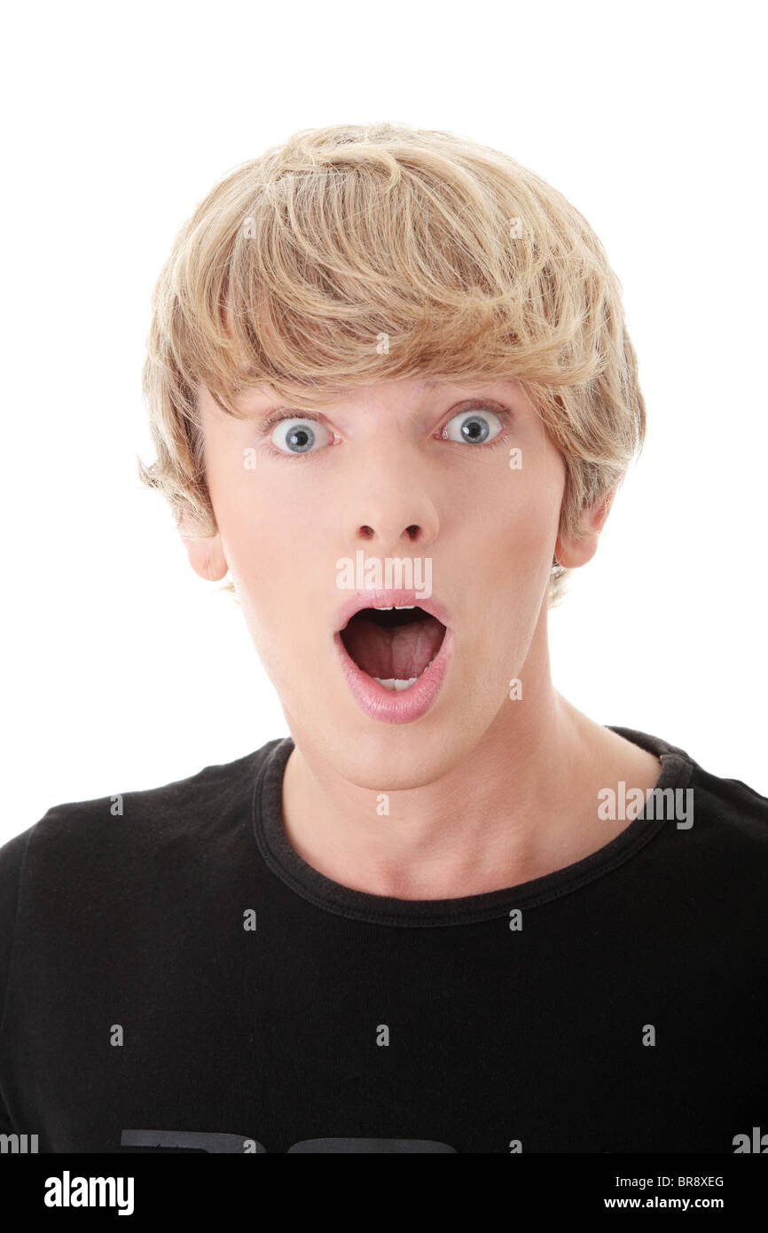 Young man with surprise expression on his face Stock Photo - Alamy