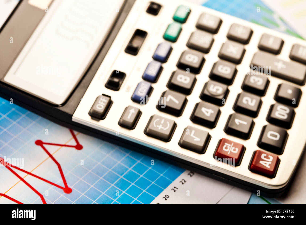 Calculator and diagram Stock Photo - Alamy