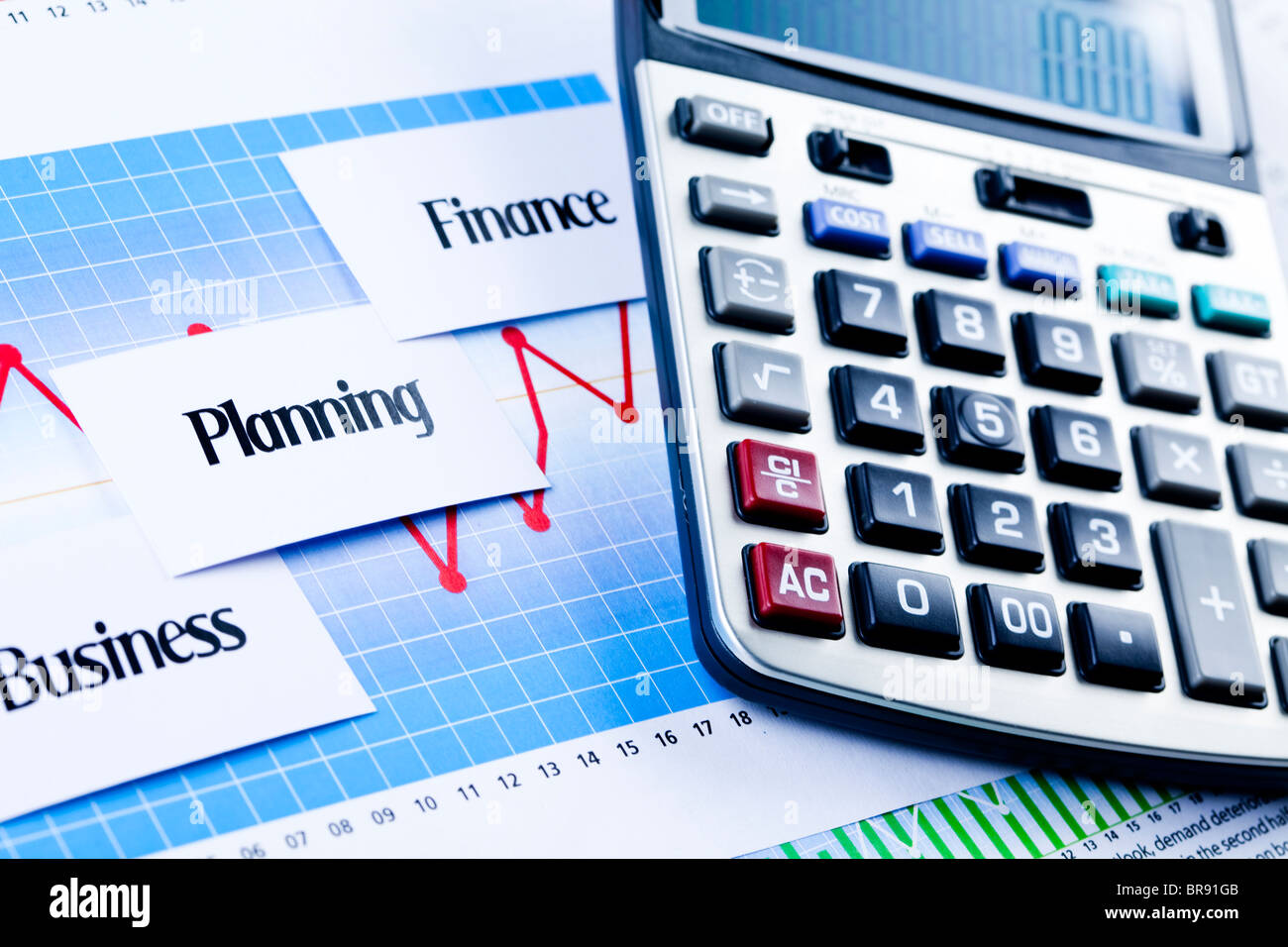 Calculator and diagram Stock Photo - Alamy