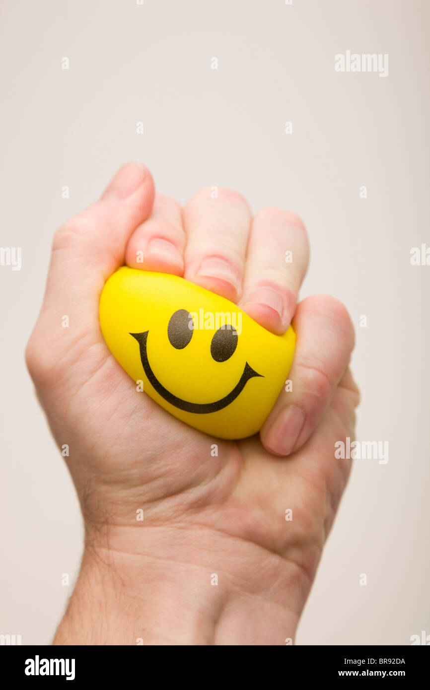 Male hand squeezing face hi-res stock photography and images - Alamy